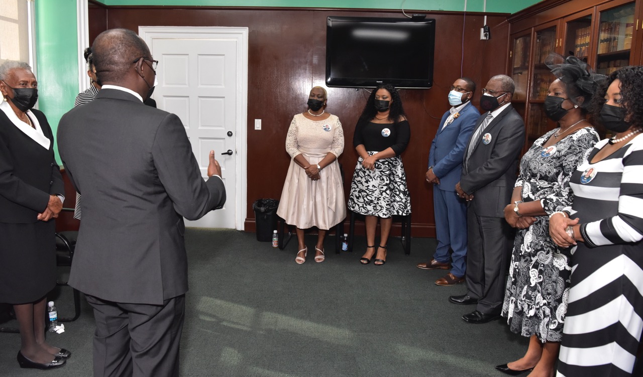 Acting PM COOPER pays respects to the family of the late Keith Archer ...