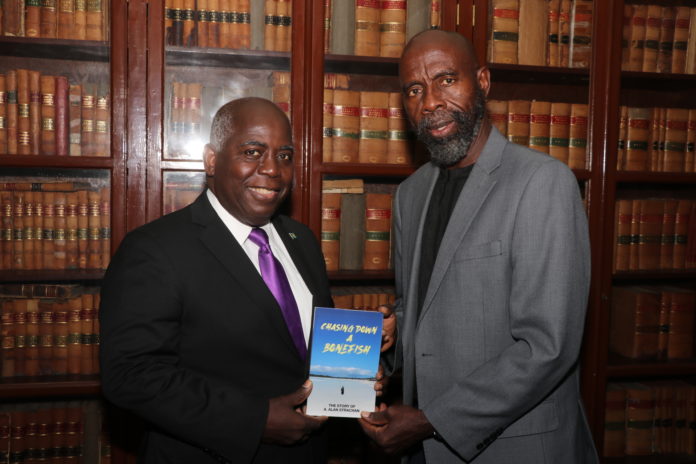 Rev A. Alan Strachan Presents Memoir to PM Davis | Bahamaspress.com