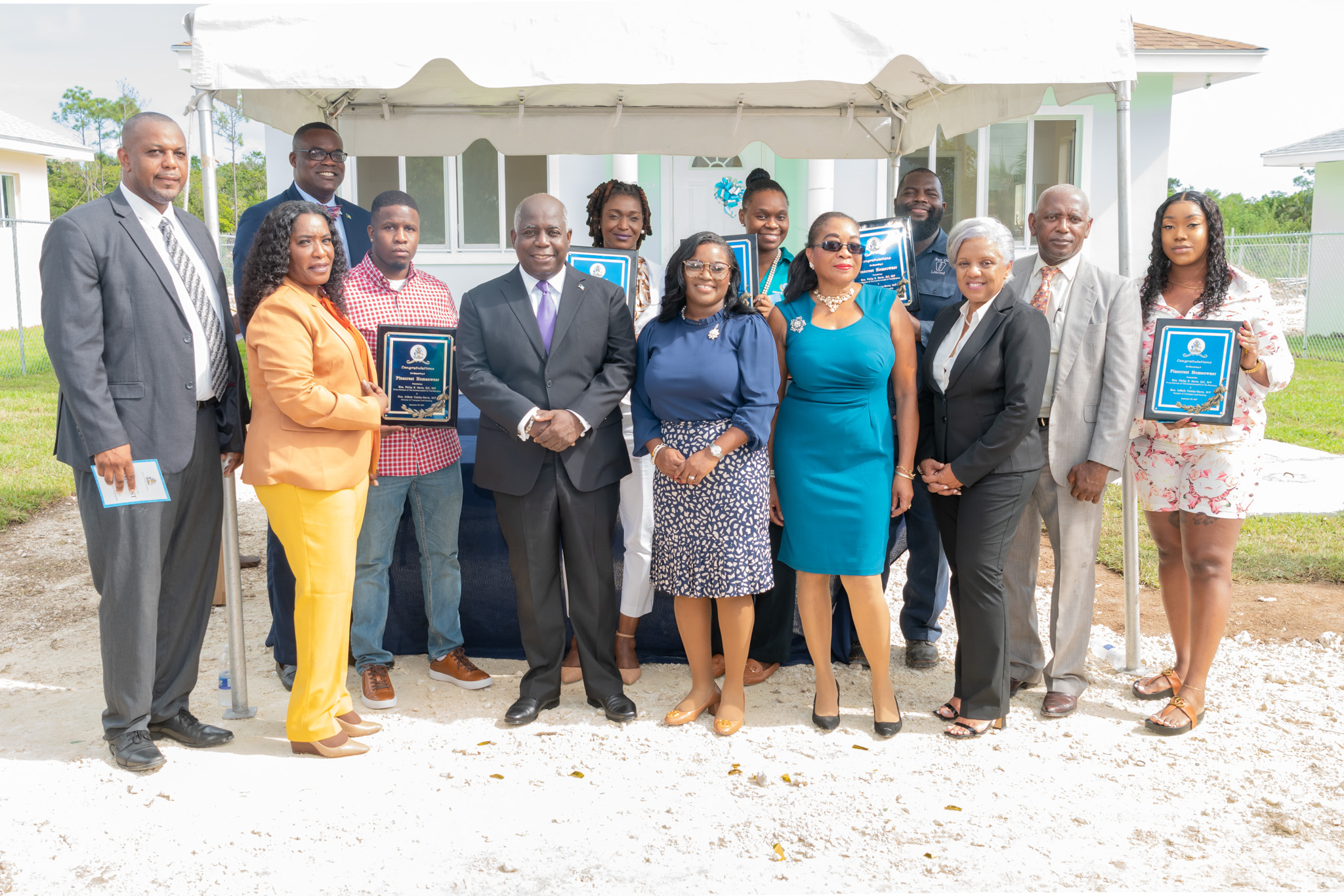 Keys presented to owners of new homes in Pinecrest Subdivision ...