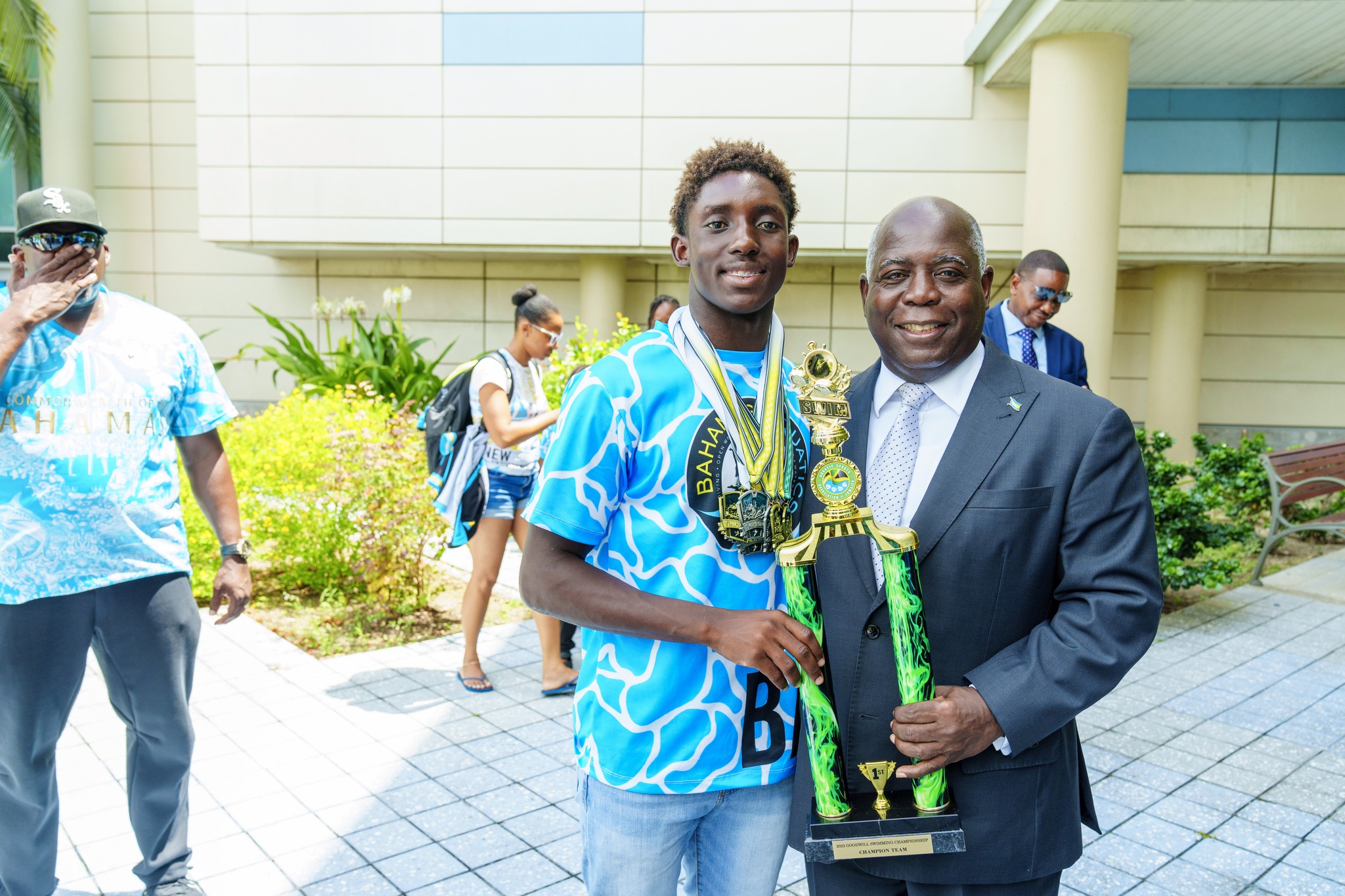 PM Davis welcomes home Victorious Bahamas Swim Team… | Bahamaspress.com