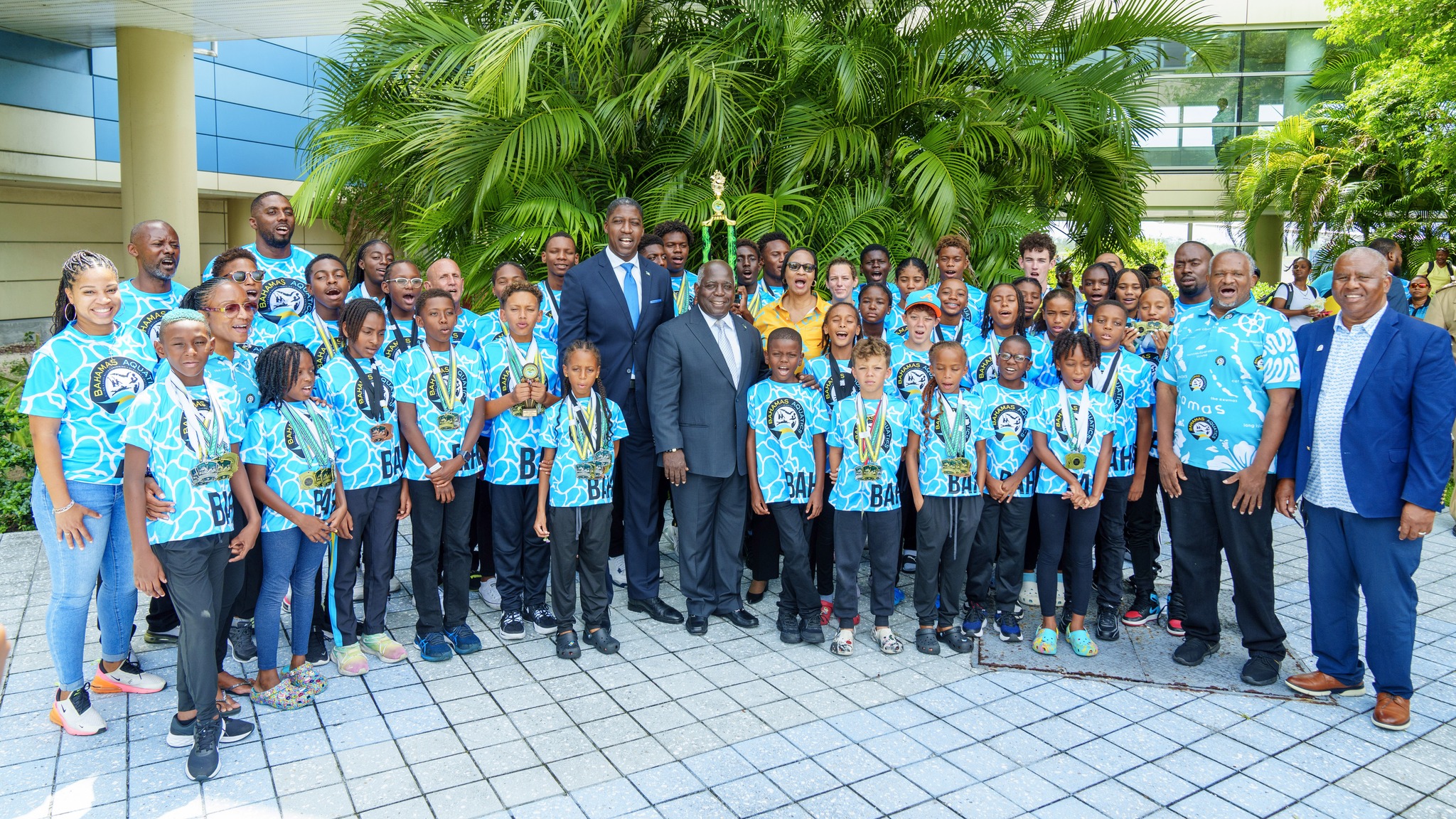 PM Davis welcomes home Victorious Bahamas Swim Team… | Bahamaspress.com