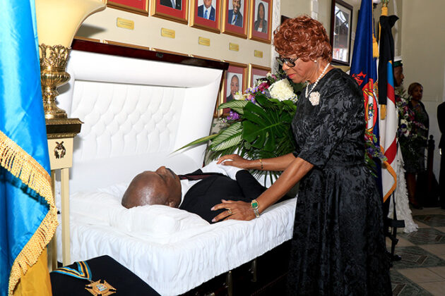 Prime Minister Davis pays respects at the Lie-in-State of the late ...